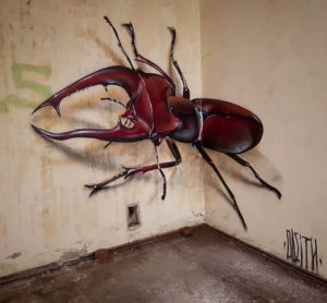 Ce graffeur crée des insectes géants qui semblent prendre vie grâce à l ...