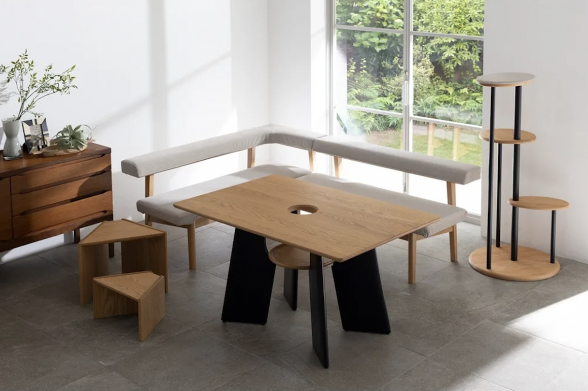 Cette table originale offre une place assise de choix pour votre chat